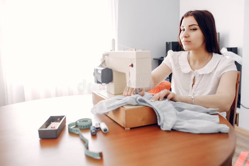 Woman Sewing on a Sewing Machine Stock Image - Image of making, machine ...