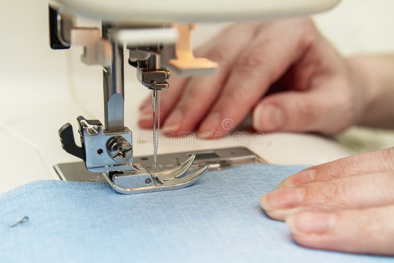 Woman Sews on a Sewing Machine. Close-up Stock Image - Image of hobby ...