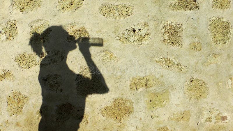 Woman Shadow Drinking Water from Bottle Stock Video - Video of happy ...