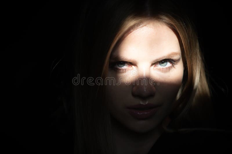 Woman in Shadow. Female Serious Model with Shadows on Face Looking ...