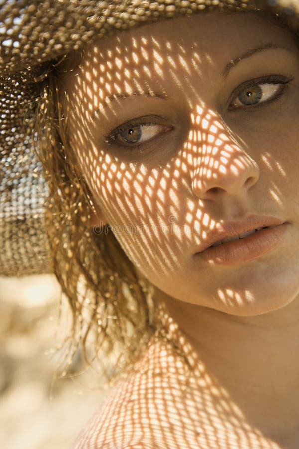 Woman with Shadow Pattern on Face. Stock Photo - Image of colour ...