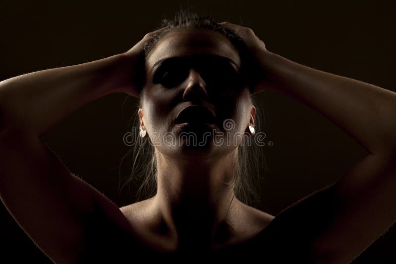 Woman in shadow stock image. Image of silhouette, face - 107919427