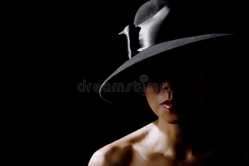 Woman in Shadow Wearing a Black Hat Stock Image - Image of hidden, noir ...