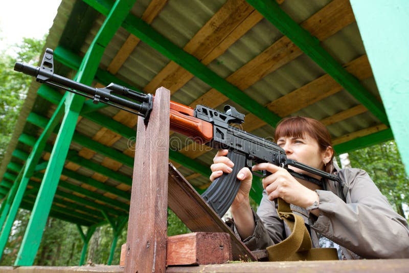 Woman Shooting an Automatic Rifle for Strikeball Stock Image - Image of ...