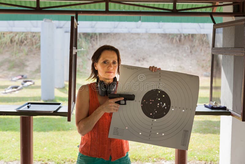A Woman at a Shooting Range Stock Image - Image of pistol, criminal ...