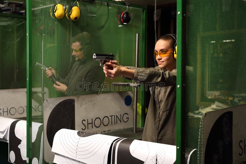 326 Woman Shooting Target Pistol Shooting Range Stock Photos - Free ...