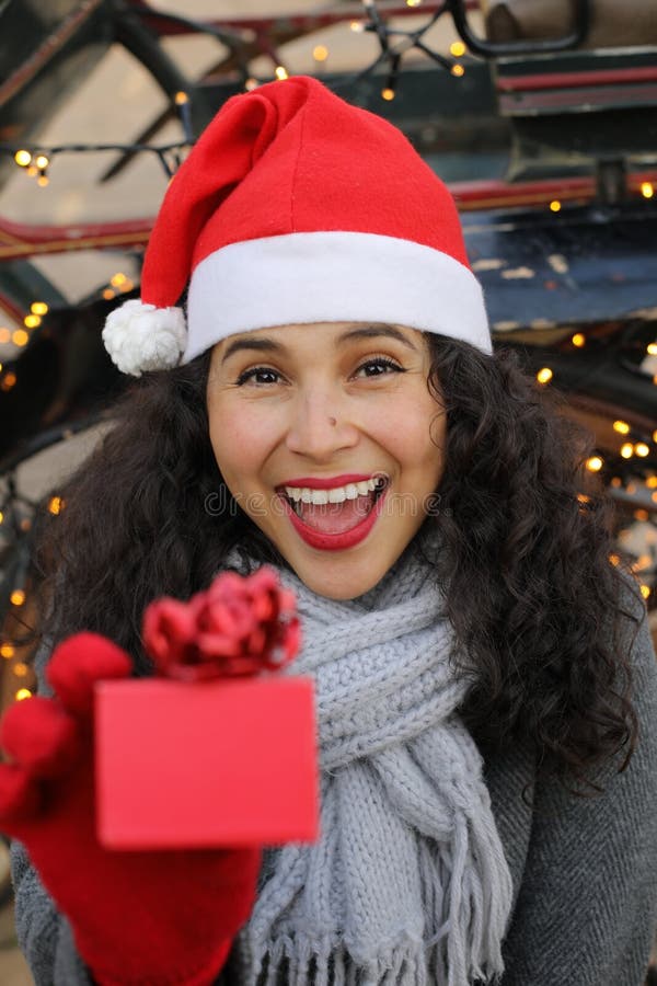 Woman Showing a Cute Christmas Present Stock Image - Image of magical ...