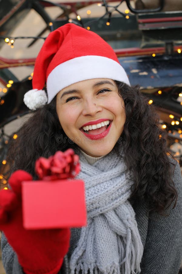 Woman Showing a Cute Christmas Present Stock Image - Image of happiness ...