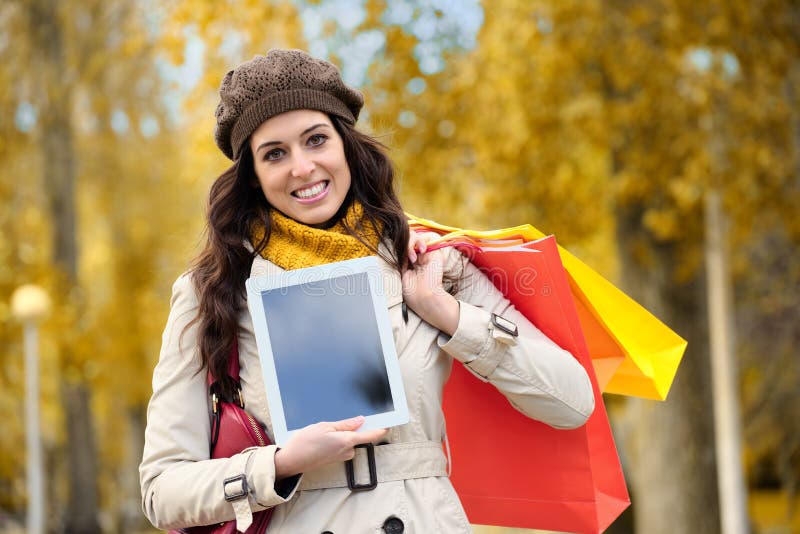 Woman Showing Digital Tablet after Shopping Stock Photo - Image of ... Woman Showing Digital Tablet after Shopping Stock Photo - Image of ...