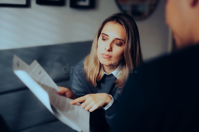 Woman Showing and Explaining Her Partner Some Documents Stock Image ...