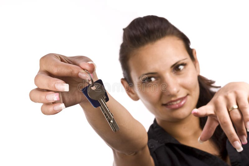 Woman showing key stock image. Image of female, attractive - 15541095