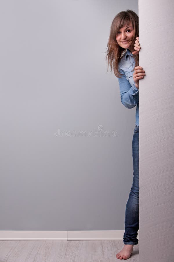 Woman Showing Up Behind the Wall Stock Image - Image of nice ...