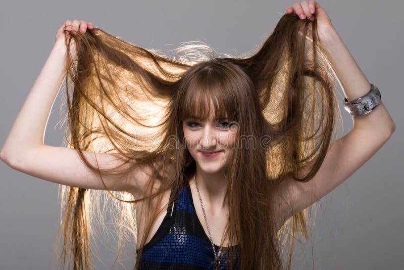 Woman Shows Her Beautiful Hair in Backlight Stock Photo - Image of ...