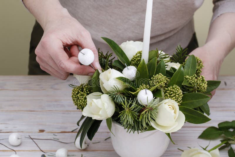 Woman Shows How To Make Floral Arrangement with White Roses Stock Photo ... Woman Shows How To Make Floral Arrangement with White Roses Stock Photo ...