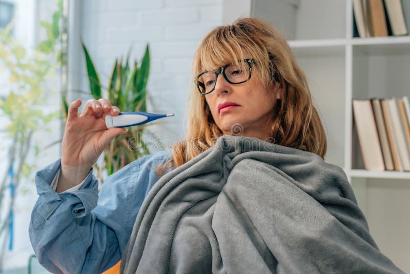 Woman Sick Looking at the Thermometer Stock Image - Image of home ...