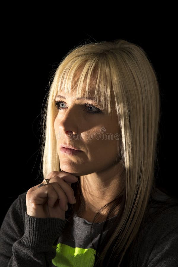 Woman Side Lit Face Serious Hand Chin Stock Image - Image of elegant ...