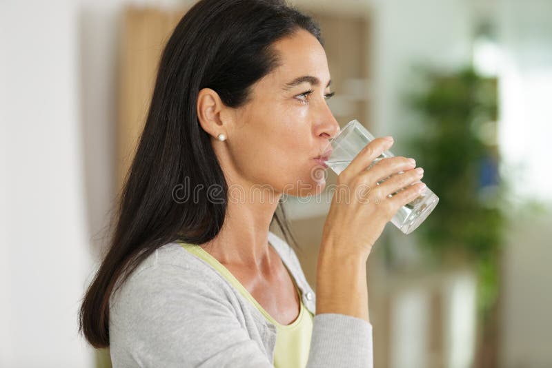 Woman on Side View Drinking Water Stock Image - Image of skincare ...