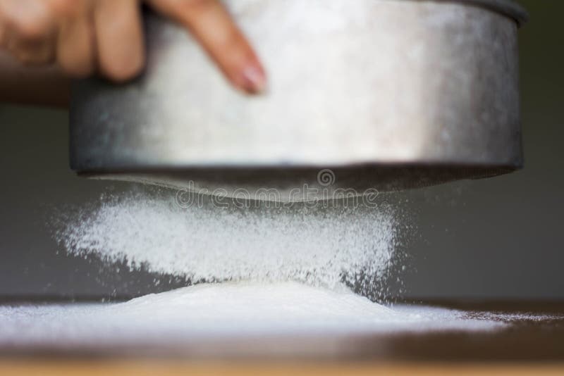Woman Sifting flour stock image. Image of cooking, sifting - 93011287