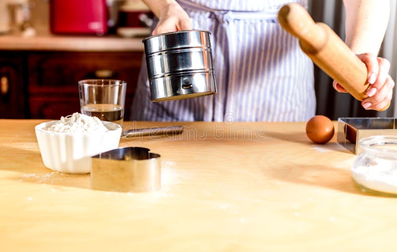 Woman Sifting Flour through Sieve. Prepares the Dough Stock Photo ...