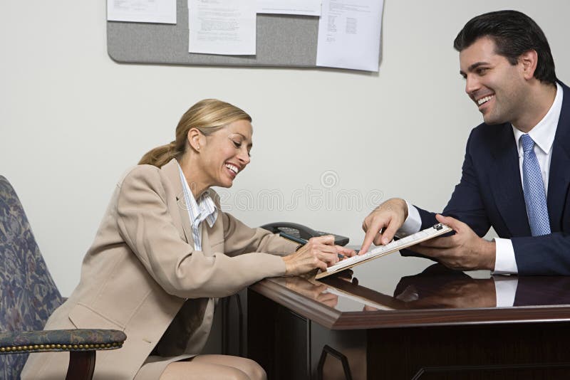Woman signing contract stock photo. Image of corporation - 62560252