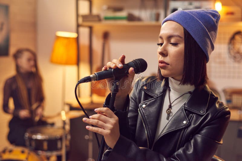 Woman Singing in Microphone Stock Image - Image of singer, equipment ...