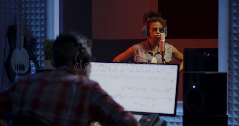 Woman Singing in Recording Booth Stock Photo - Image of inside, singer ...