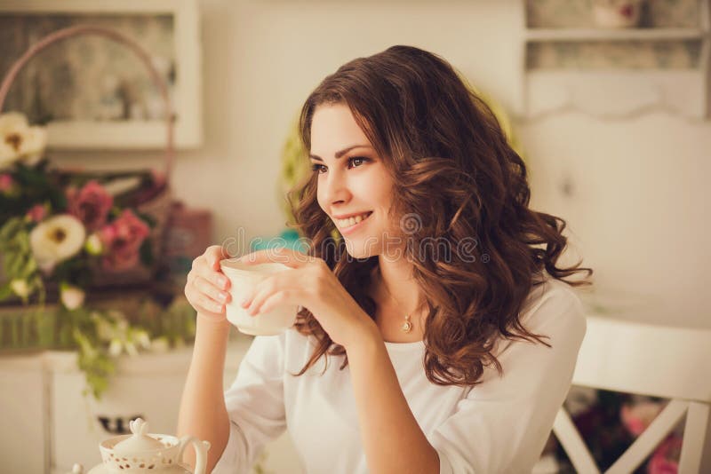 Woman sipping tea stock photo. Image of beauty, happiness - 62208430