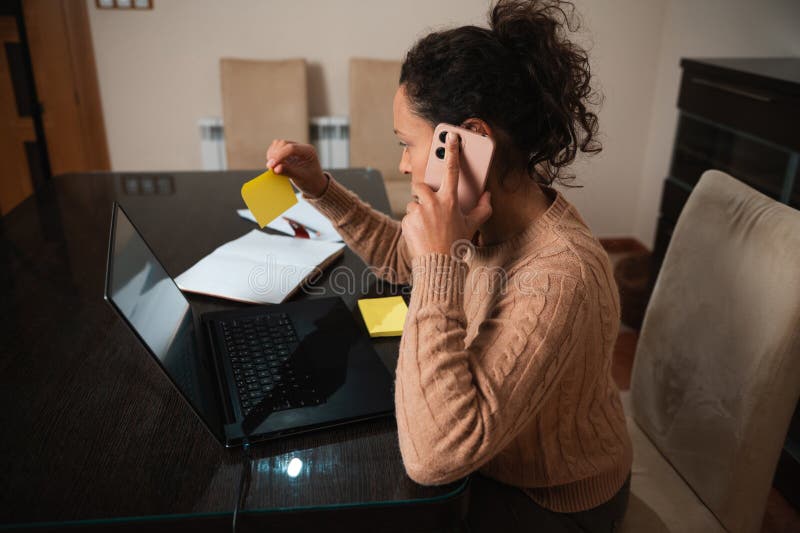 Woman Multitasking at Home Office with Laptop and Phone Stock Image ...