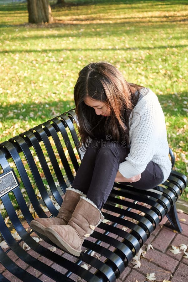 Woman sitting on bench stock photo. Image of adorable - 35336072