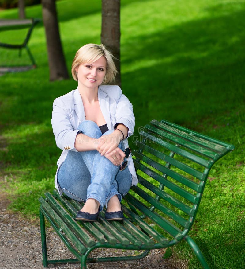 Woman Sitting on Bench in Park Square Stock Image - Image of sitting ...