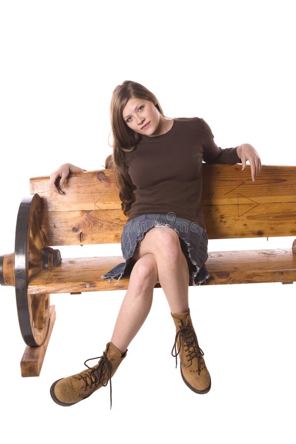 Woman Sitting on Bench Serious with Skirt Stock Photo - Image of ...