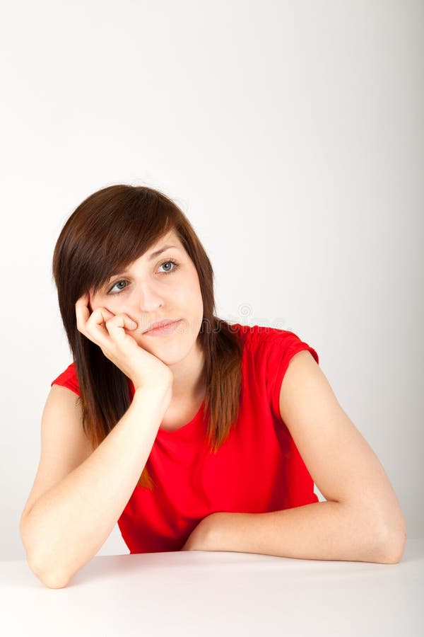 The Woman is Sitting Bored at a Table Stock Image - Image of portrait ...