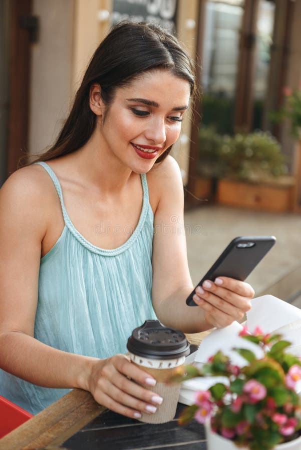Woman Sitting in Cafe Outdoors Stock Image - Image of smile, happy ...