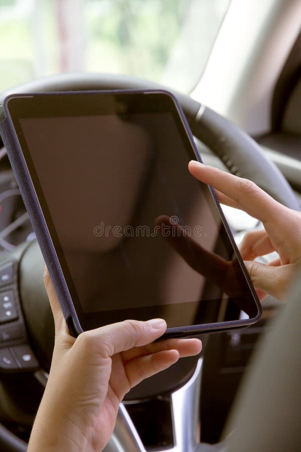 Woman Sitting in the Car and Using Digital Tablet Stock Photo - Image ...