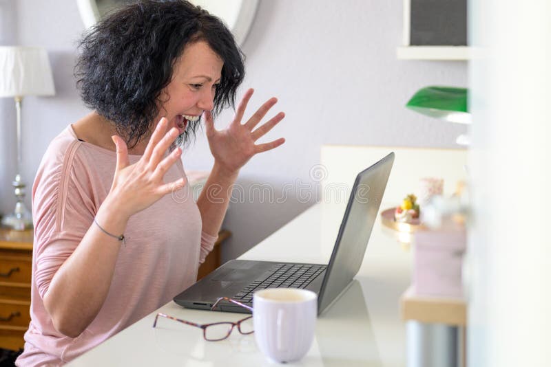 Woman Screaming in Front of Her Computer Stock Image - Image of female ...