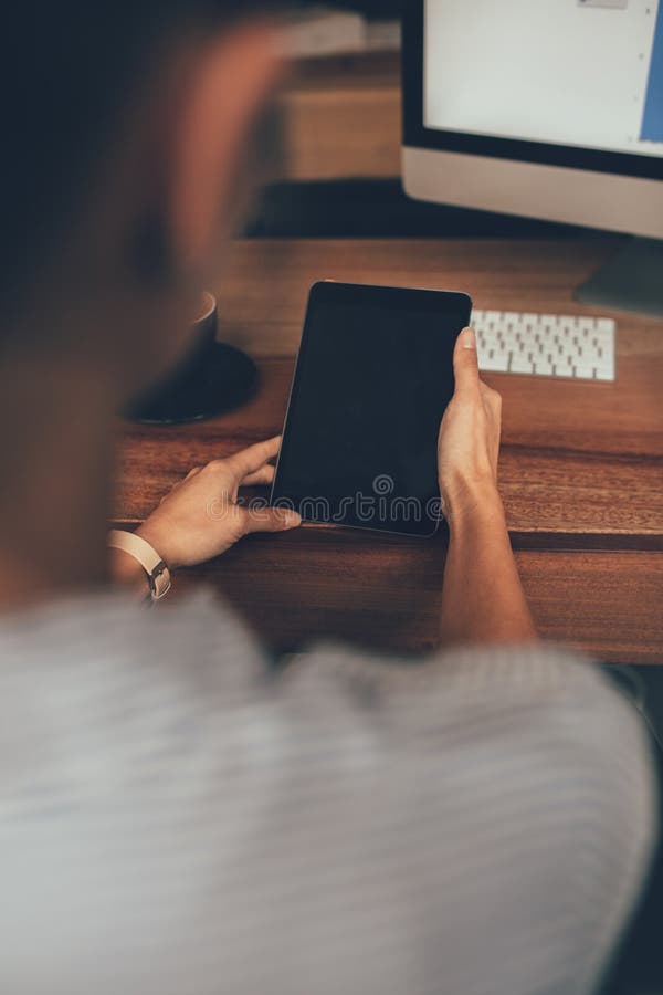Woman Sitting at Her Desk Using Digital Tablet Stock Image - Image of ...