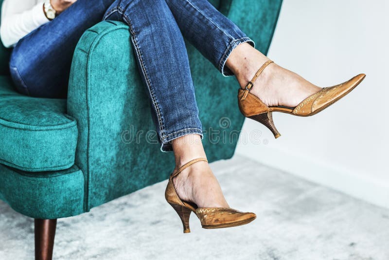 Woman Sitting with High Heels on Stock Photo - Image of happy, exchange ...