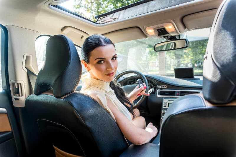 Woman Sitting Inside New Car Offering Key Stock Image - Image of ...