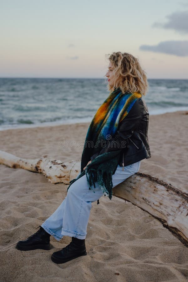 Woman Sitting on the Log at the Beach Stock Photo - Image of alone ...