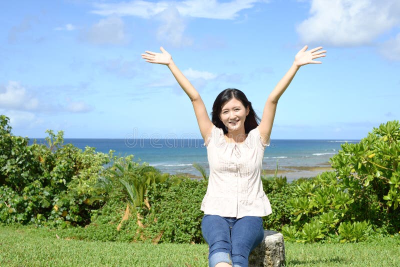 Woman enjoy the sun. stock image. Image of beach, coast - 112441089