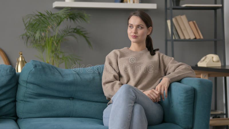 Woman Sitting on Sofa Thinking Stock Photo - Image of home, ideas ...