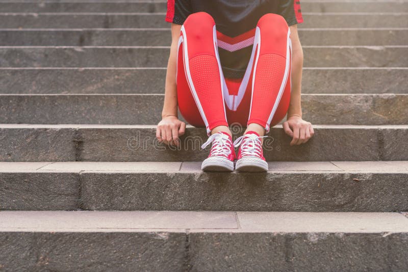 Woman sitting on stairs stock photo. Image of stairs - 155786478