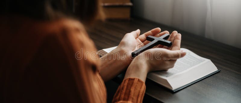 Woman Sitting and Studying the Scriptures.the Wooden Cross in the Hands ...