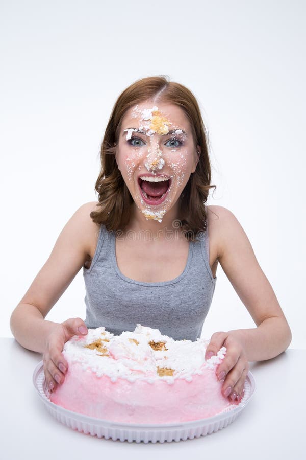 Woman Sitting at the Table with Cake on Her Face Stock Image - Image of ...
