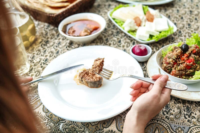 Woman Eating Meal with a Fork Stock Image - Image of restaurant ...
