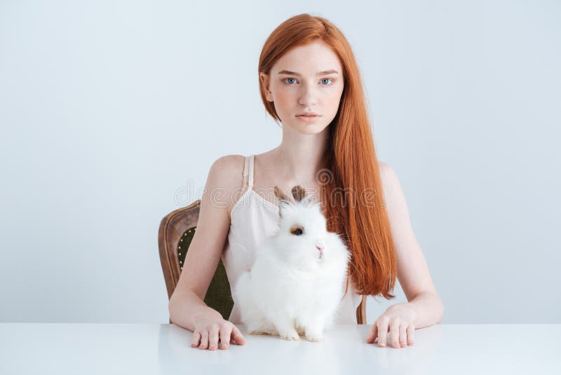 Redhead Woman Sitting Table Rabbit Stock Photos - Free & Royalty-Free ...