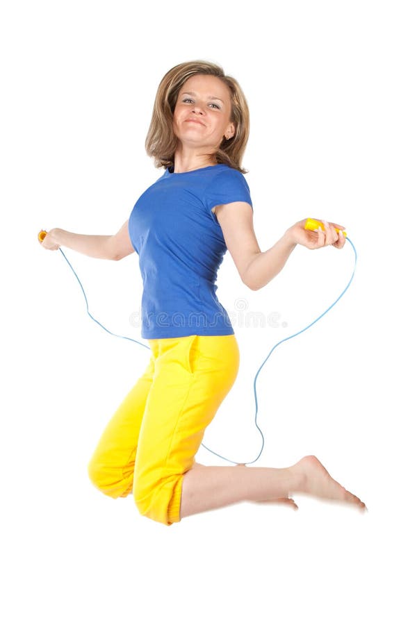 Woman with skipping-rope stock photo. Image of female - 18745084