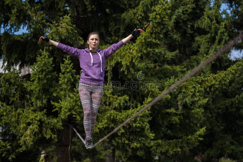 Woman Slacklining at Sunny Day Stock Photo - Image of barefooted, slack ...