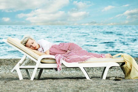 Woman sleep on beach stock image. Image of lounger, beach - 17663311