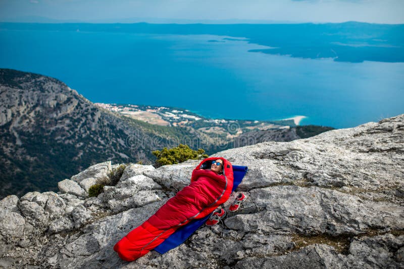 Woman in Sleeping Bag on the Mountain Stock Image - Image of extreme ...